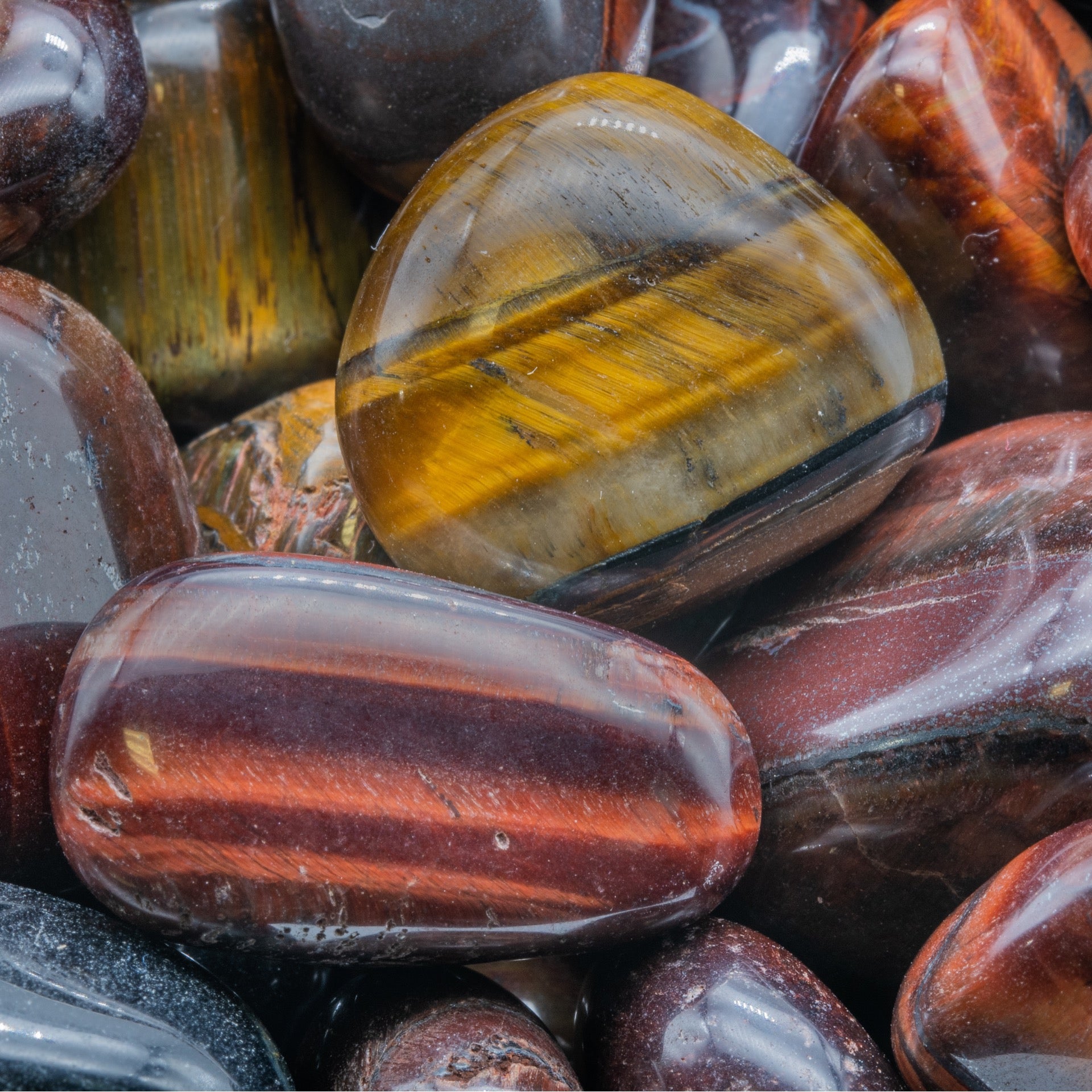 Tigers Eye tumbled stone | Geology Rocks! And Minerals